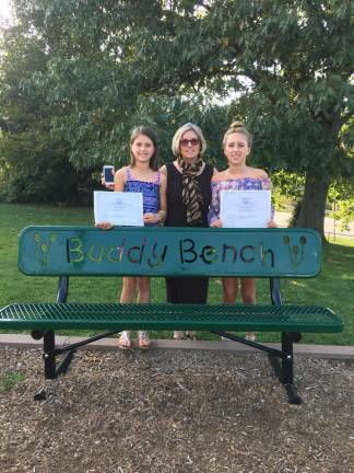 Sisters determined to show kindness with 'Buddy Bench'