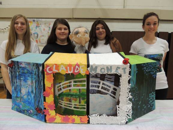 Students collaborate for puppet show