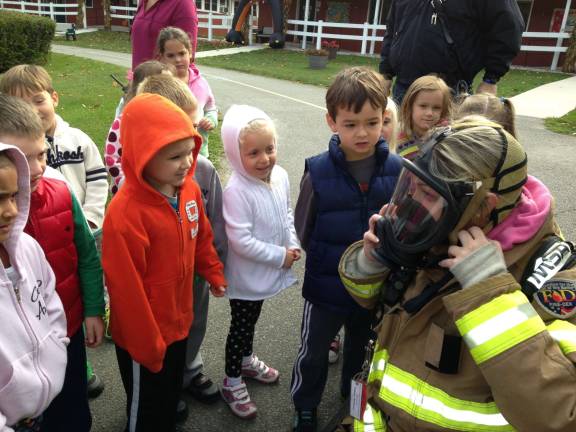 Firefighters teach children about fire prevention