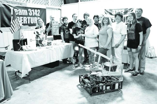 Robotics team raises money at county event