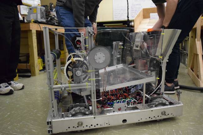 High school robotics teams 'turn gears' for competition Newton and ...