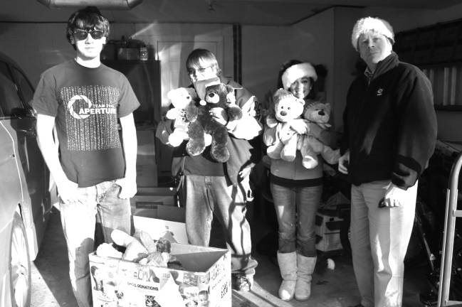 Robotic team collects shoes and teddy bears for donating